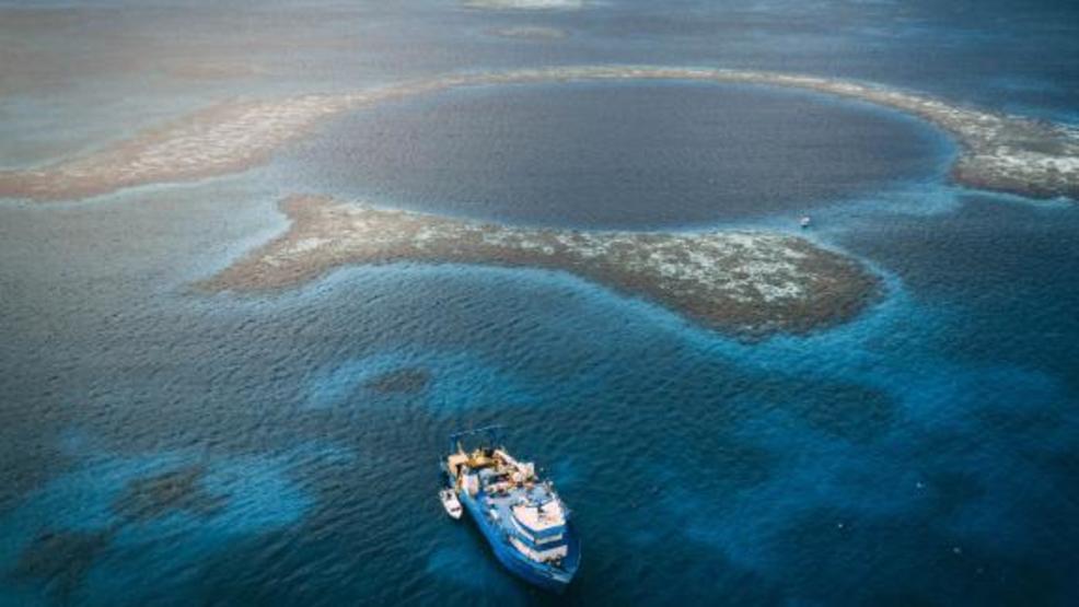 Team of scientists, explorers map 410-foot-deep Great Blue Hole in ...